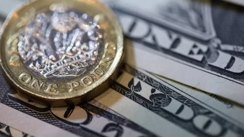 Why is the British pound falling in value?